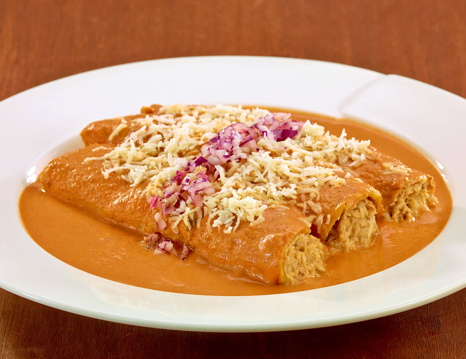 Entomatadas de pollo con frijol - Recetas | La Costeña®